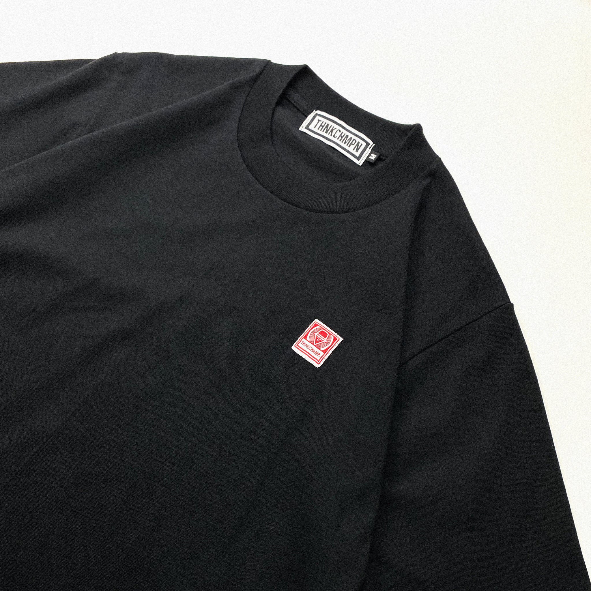 ICONIC PATCH | OVERSIZED TEE IN BASALT BLACK – THNKCHMPN